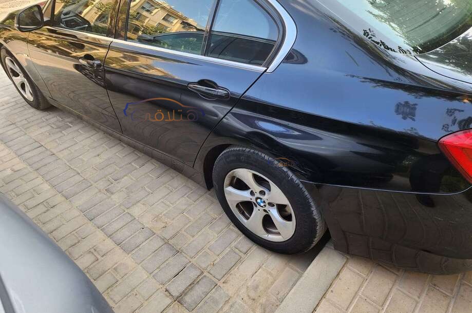 316 BMW 2013 Tagamo3 - New Cairo Black 7100312 - Car for sale : Hatla2ee