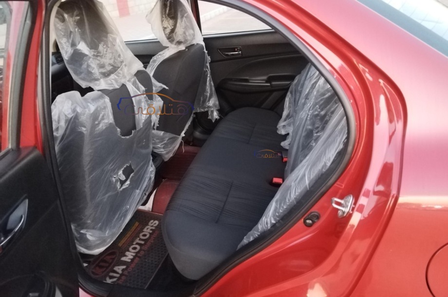 Swift Dzire Suzuki 2022 Cairo Red 7100513 - Car for sale : Hatla2ee