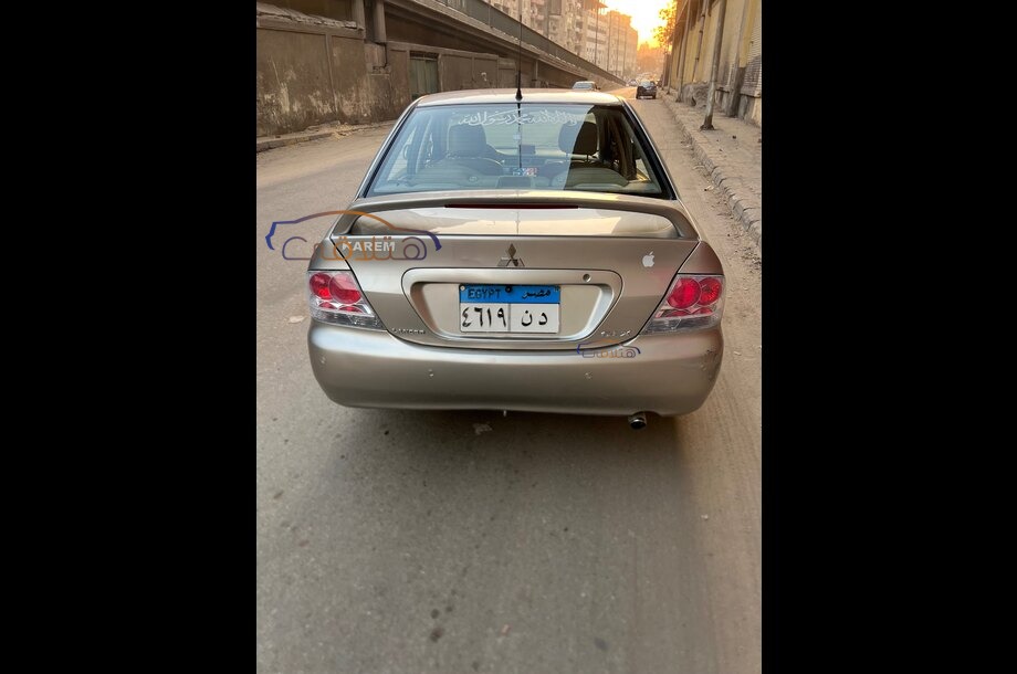 Lancer Puma Mitsubishi 2009 Giza Silver 7110619 - Car for sale : Hatla2ee