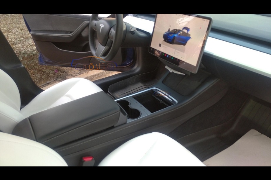 Model 3 Tesla 2023 6 October Blue 7110808 - Car for sale : Hatla2ee