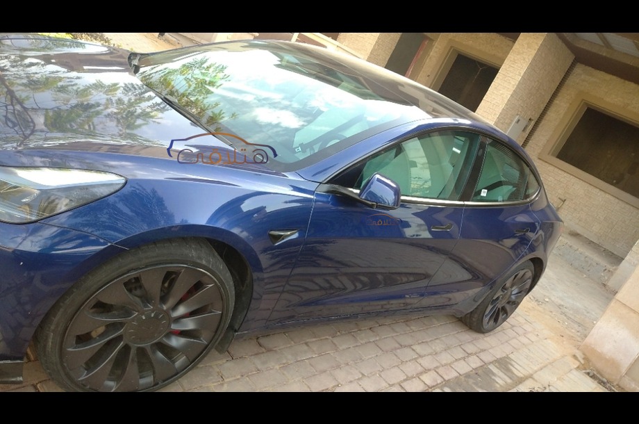Model 3 Tesla 2023 6 October Blue 7110808 - Car for sale : Hatla2ee