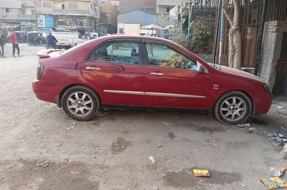 Cerato Kia 2005 Shubra al-Khaimah Red 7111801 - Car for sale : Hatla2ee